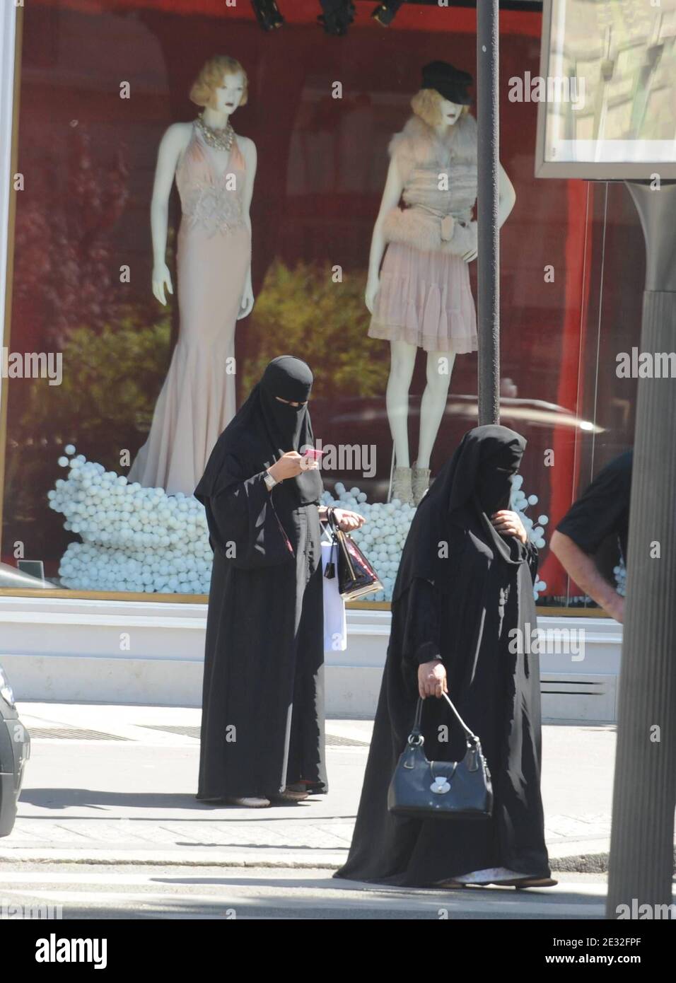 Illustration of women wearing full Islamic veil ( Burka or Niqab ) on ...