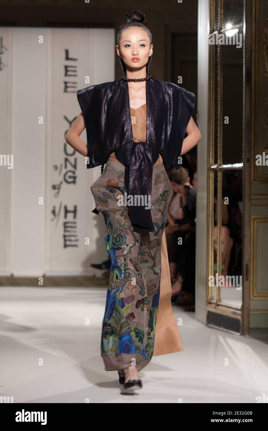A model displays a creation by Korean designer Lee Young Hee during the ...