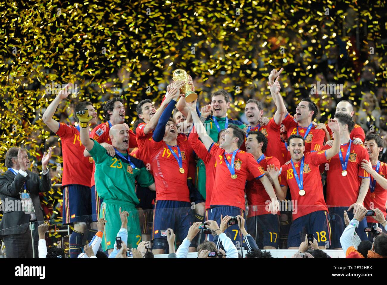 Spanish players celebrate with the trophy following the 2010 FIFA World ...