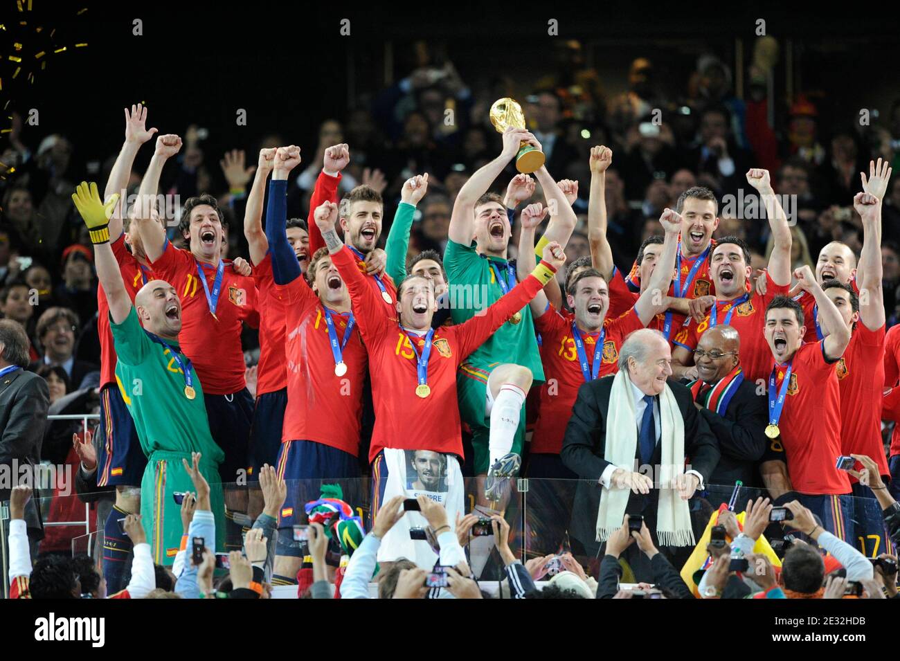 Spanish players celebrate with the trophy following the 2010 FIFA World ...