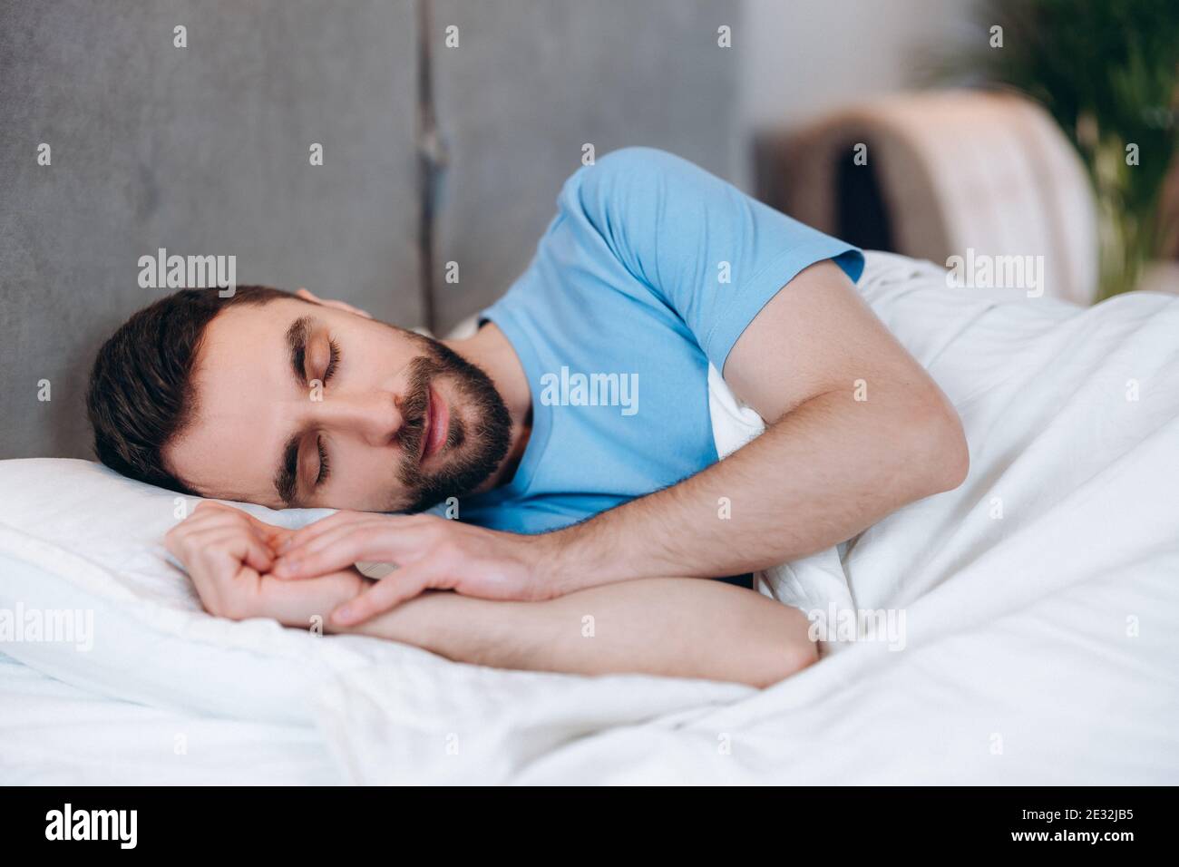 Person lying awake in bed hi-res stock photography and images - Alamy