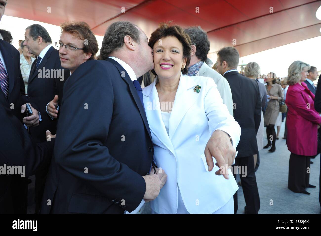 Pierre Charon and Roselyne Bachelort attend the Bastille day parade on ...