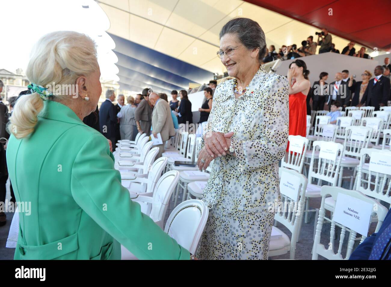 Simone Viel speaks with Nicole Raffel Dassault during the Bastille day ...