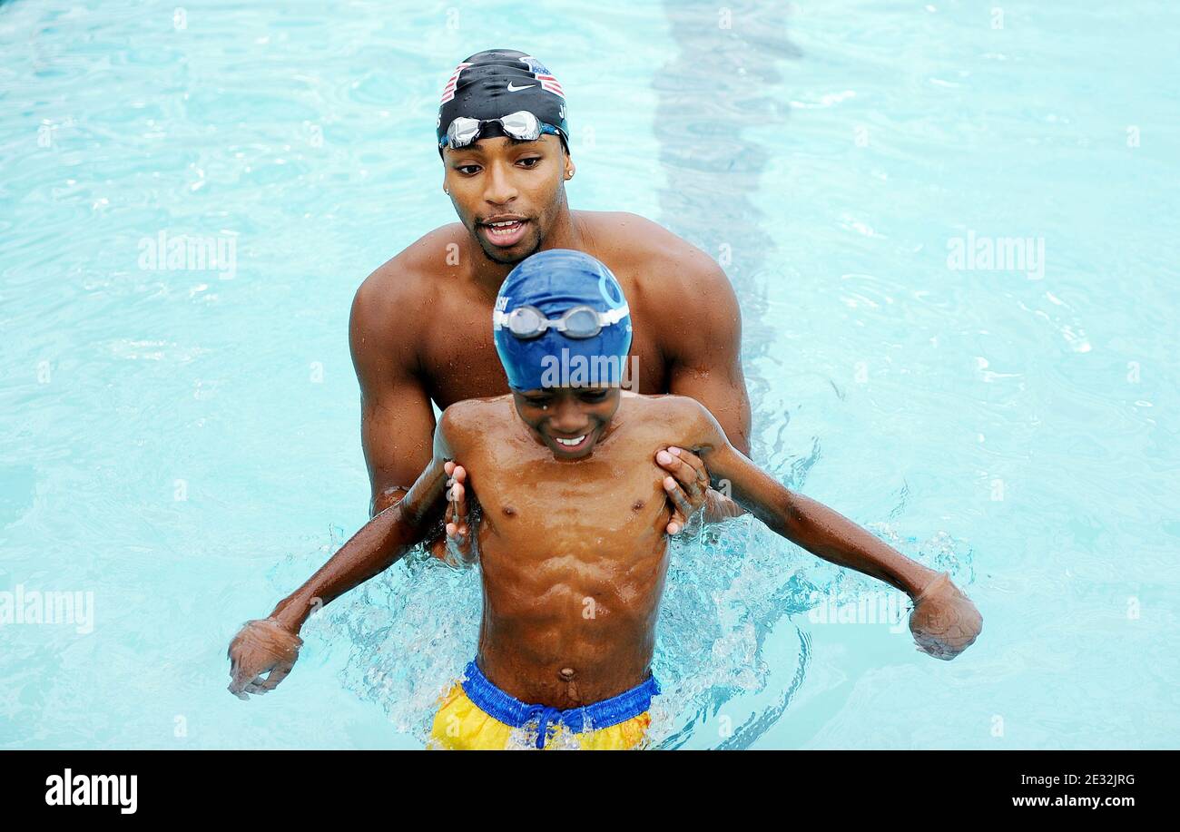 US Olympic gold medalist swimmer Cullen Jones teaches kids how to swim during the National Water ...