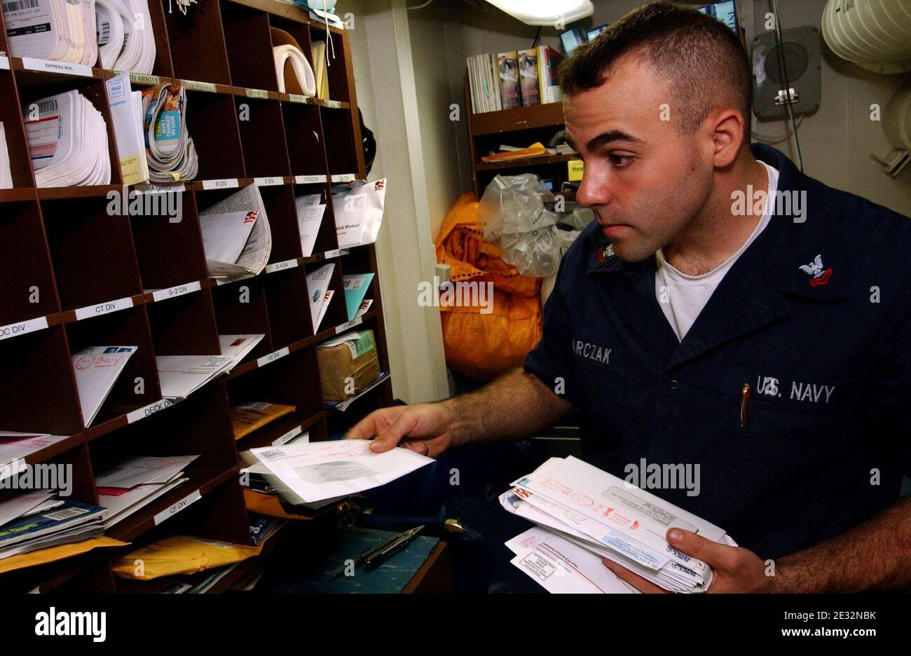 Mailroom at cruiser USS Normandy Stock Photo - Alamy