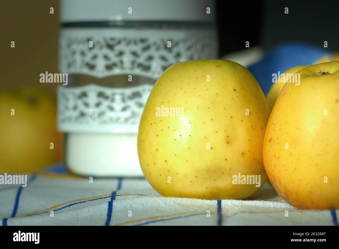 Several bright yellow apples. yellow apples prepared to be cooked in ...