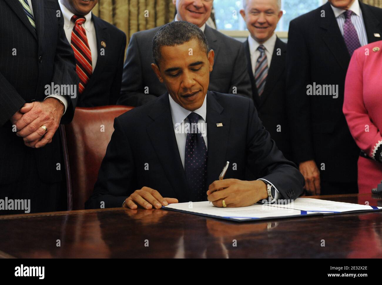Barack Obama signs the Fair Sentencing Act in the Oval Office of the ...