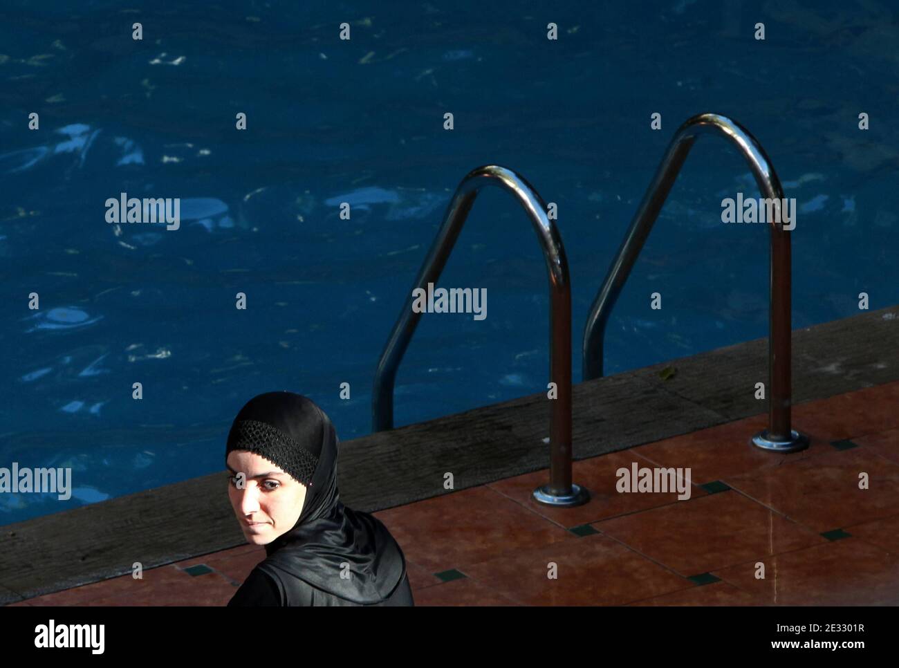 Atmosphere in the swimming-pool of Rif hotel of Tanger, a woman after ...