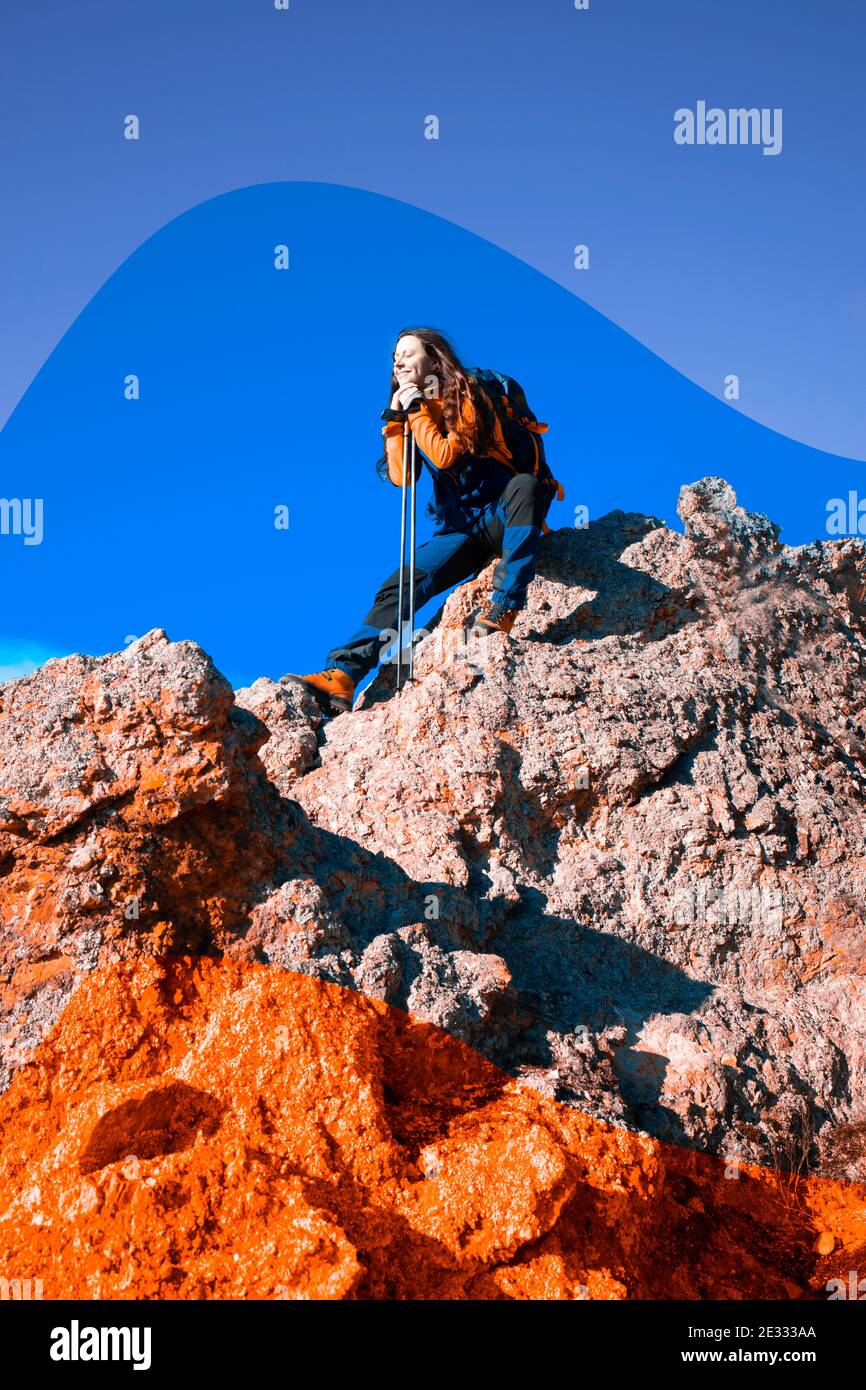 Female sitting in nature and enjoying her day and relaxing in the sun ...