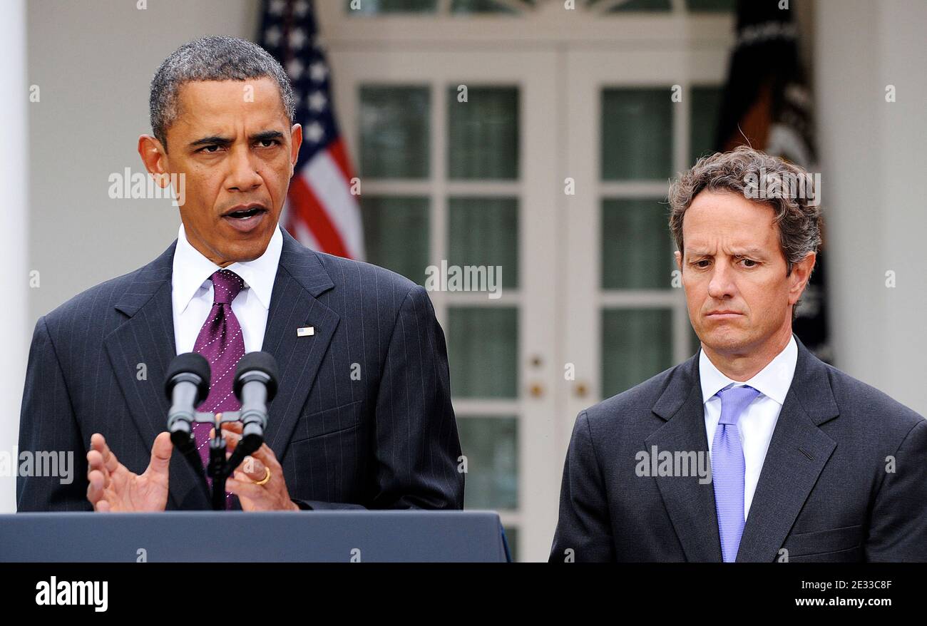 Looks on as us treasury secretary tim geithner hi-res stock photography ...