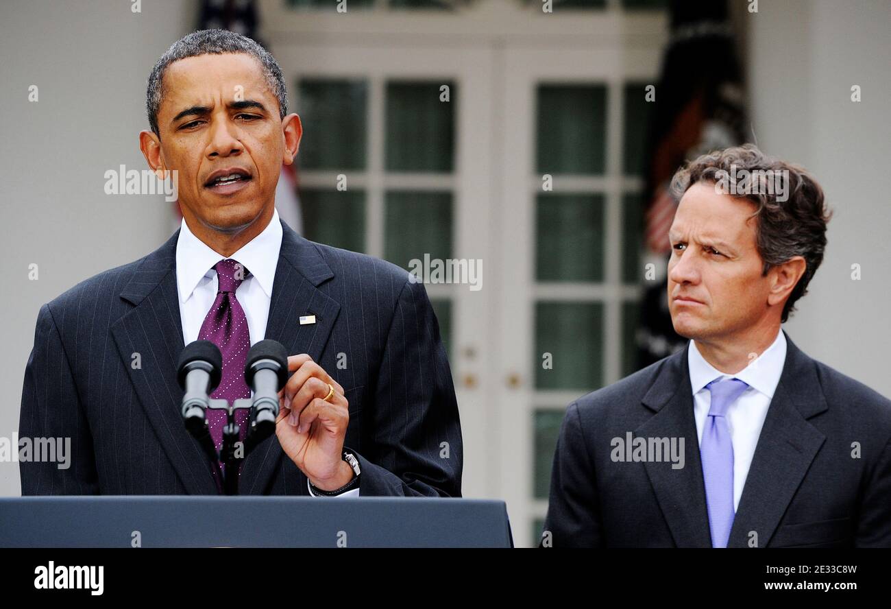 Looks on as us treasury secretary tim geithner hi-res stock photography ...
