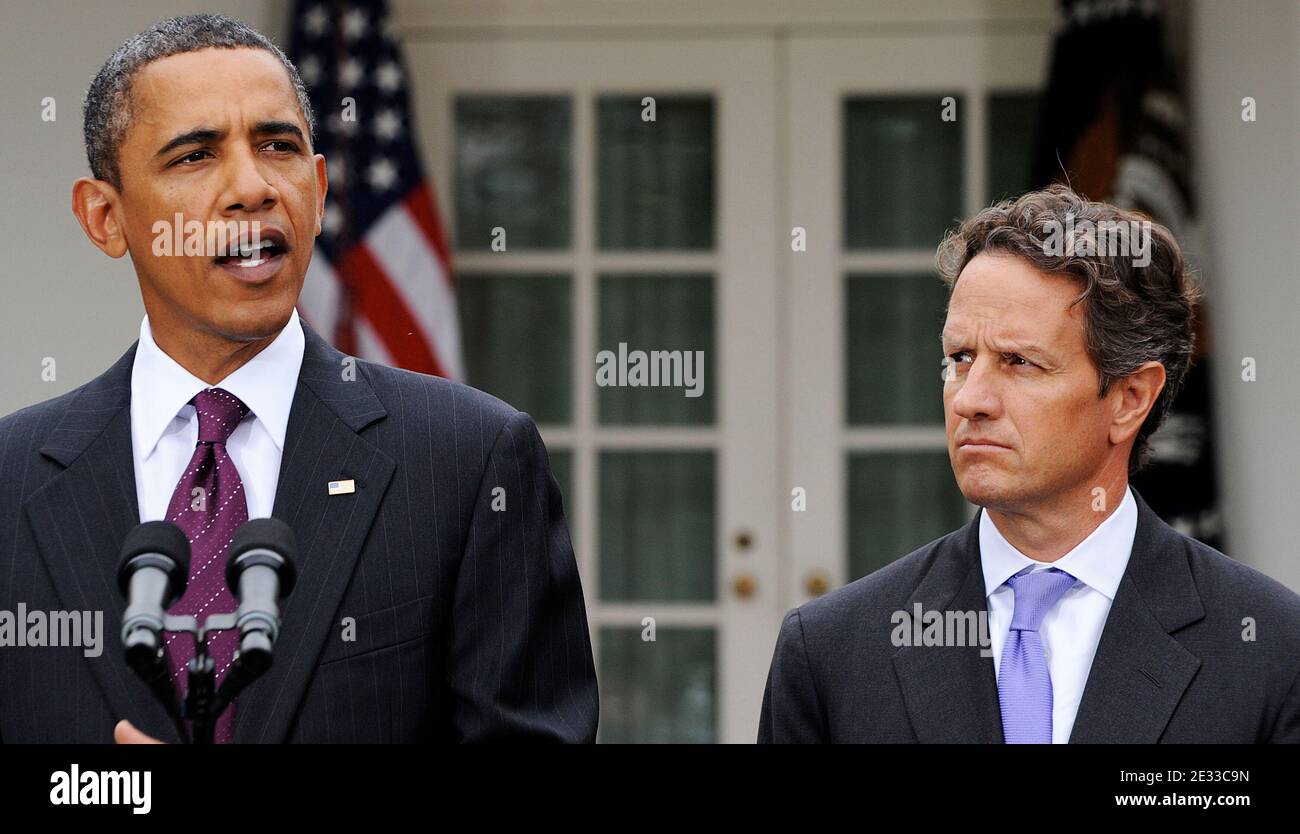 Looks on as us treasury secretary tim geithner hi-res stock photography ...