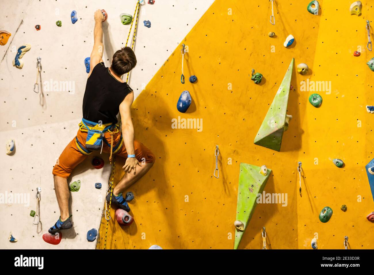 A rock climbing wall for background Stock Photo - Alamy