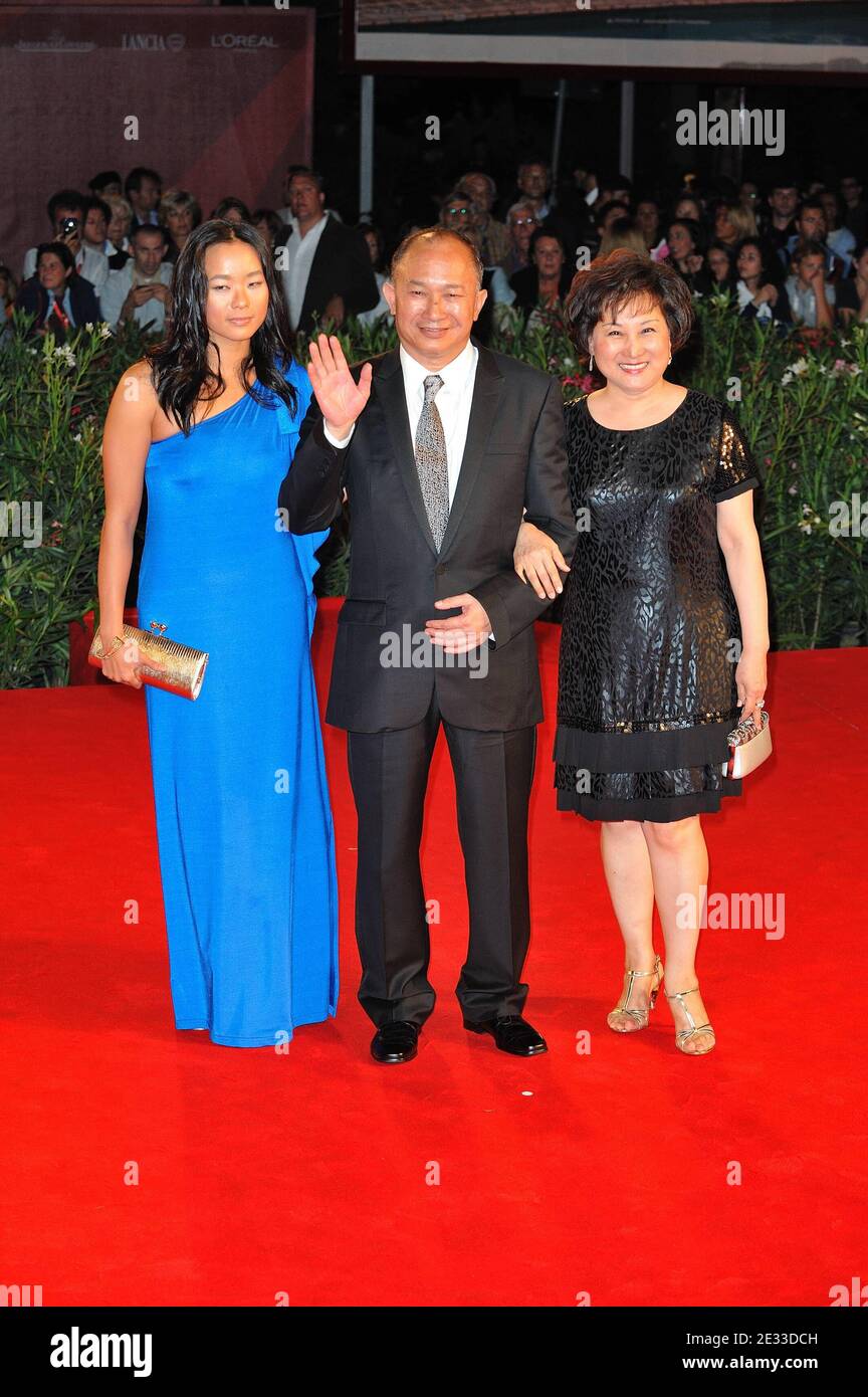 Director John Woo with wife Annie Woo and daughter Angeles Woo arriving ...