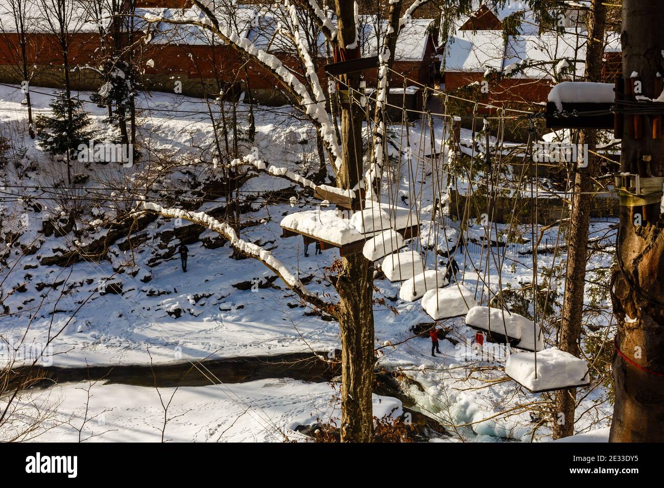 The obstacle course in adventure park winter Stock Photo - Alamy