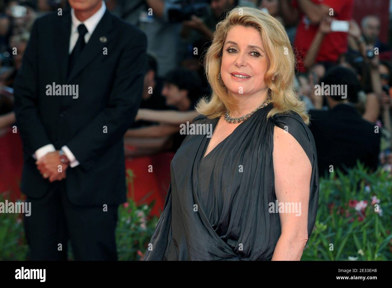 Catherine Deneuve arriving for the screening of 'Potiche' at the Sala ...