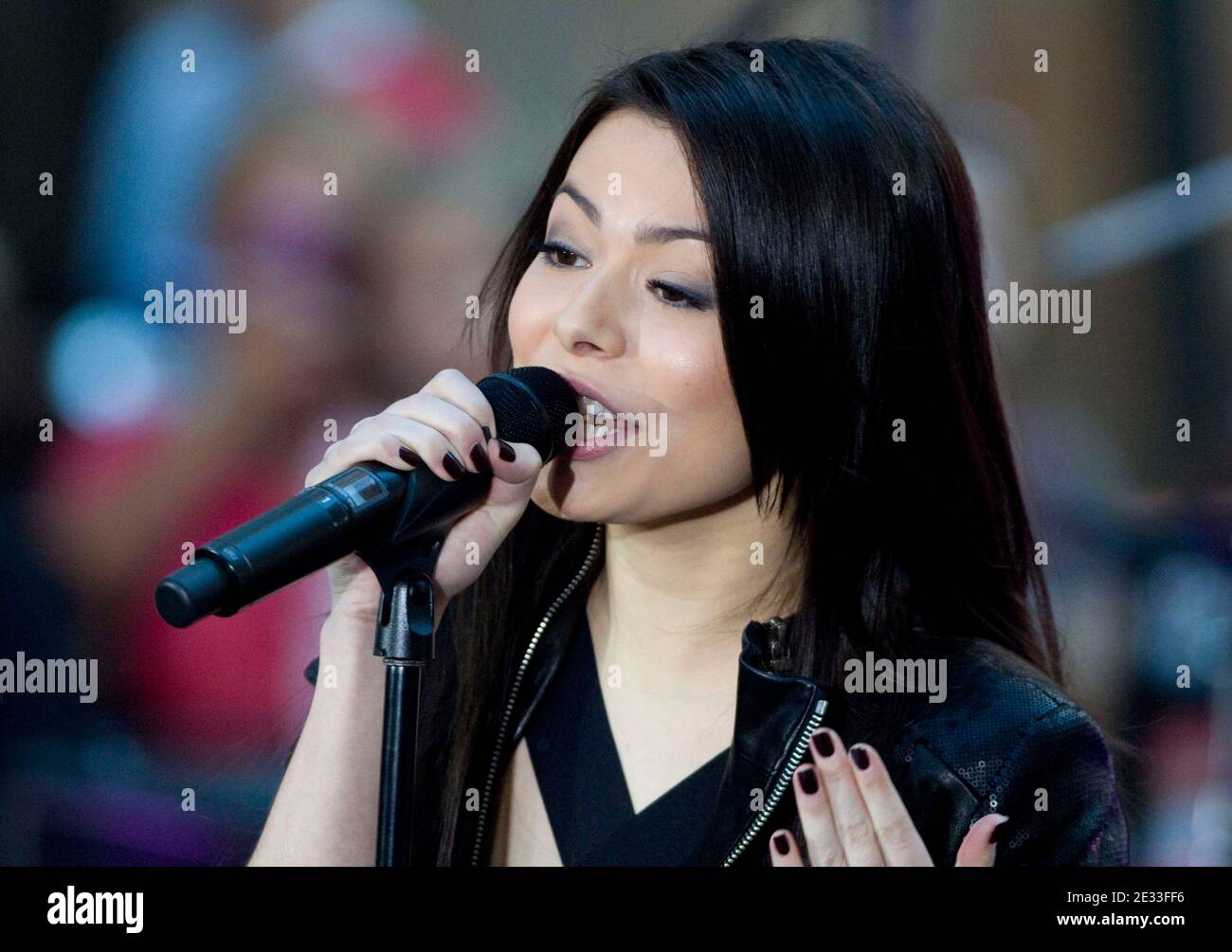 Singer Miranda Cosgrove signs autographs following her performance ...
