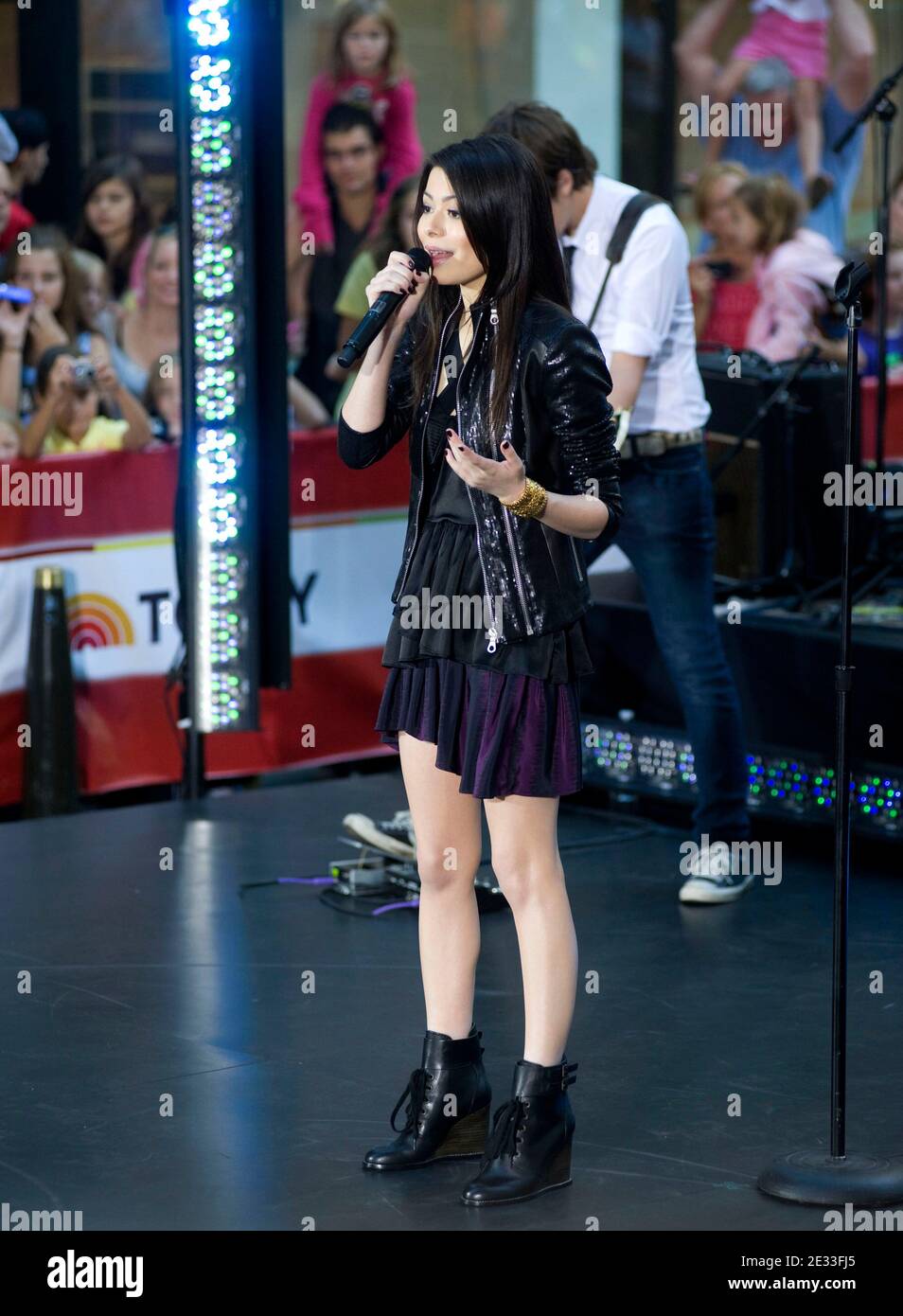 Singer Miranda Cosgrove signs autographs following her performance ...