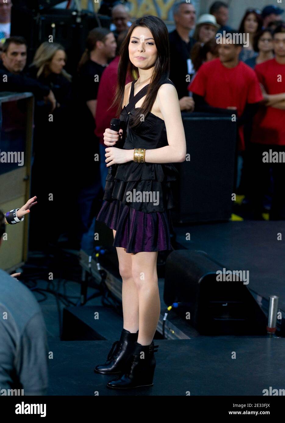 Singer Miranda Cosgrove signs autographs following her performance ...