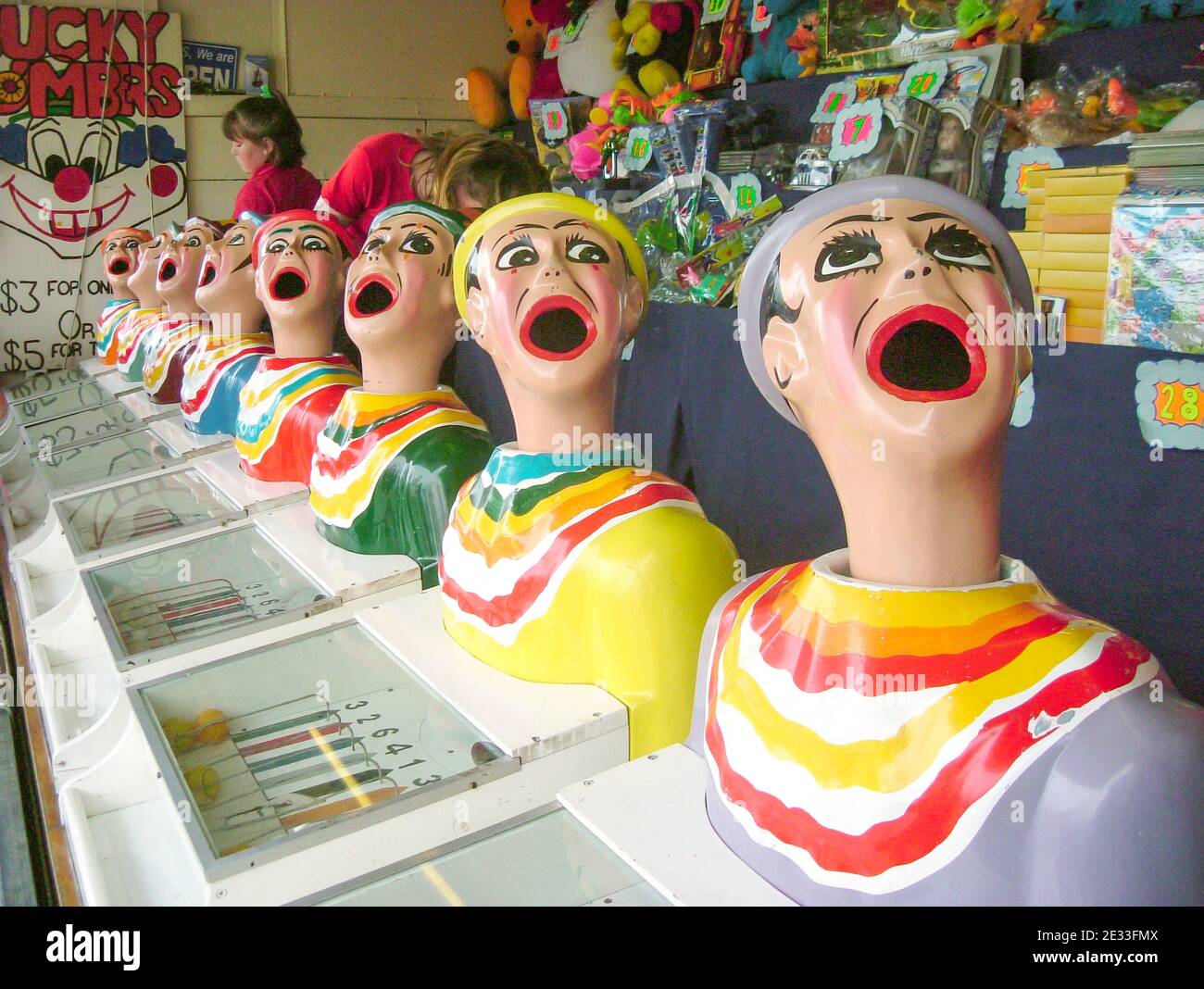 Traditional funfair clowns at fairground stall, Canterbury A&P Show ...
