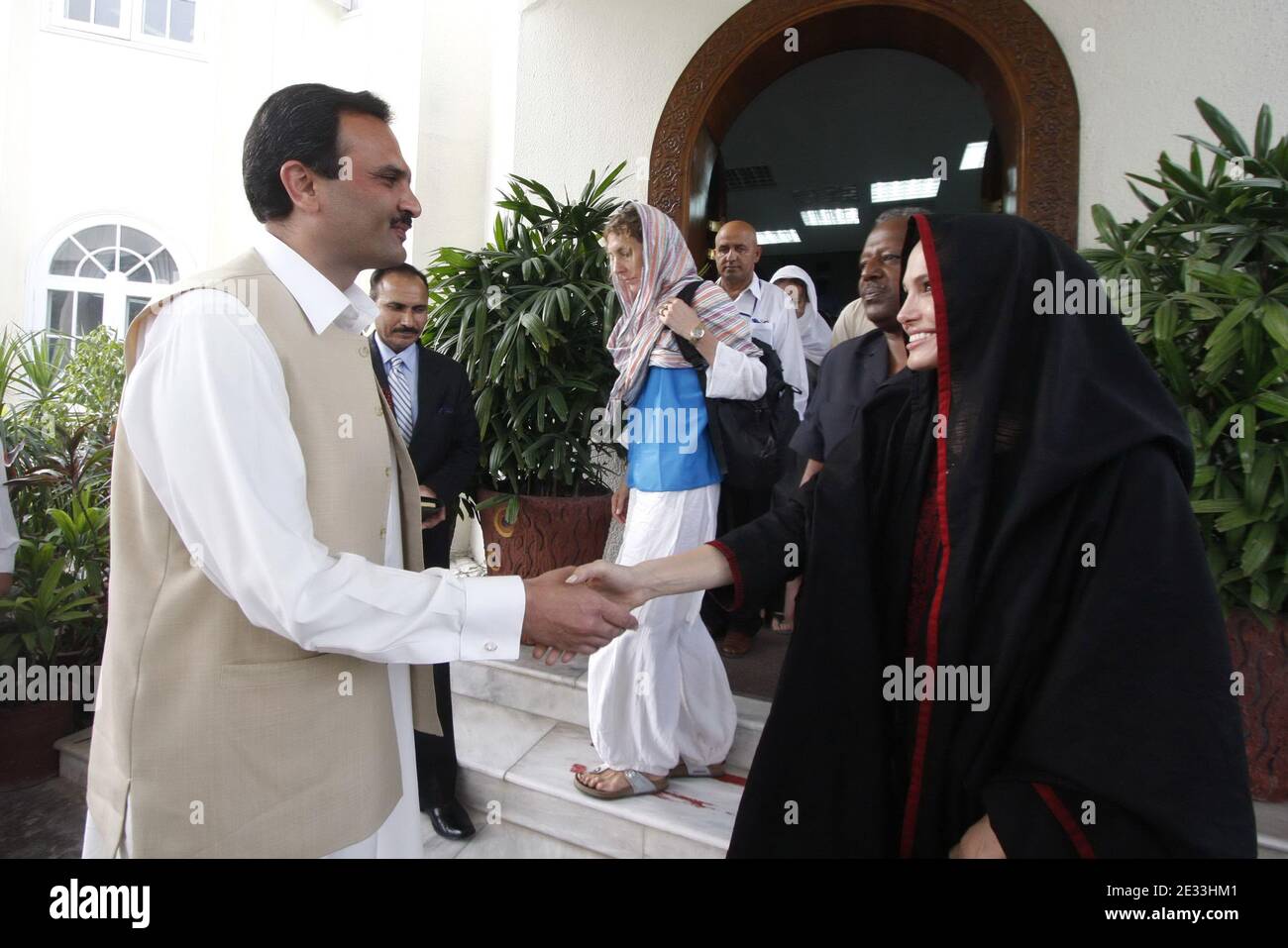 UNHCR Goodwill Ambassador Angelina Jolie meets with Amir Haider Hoti (L ...