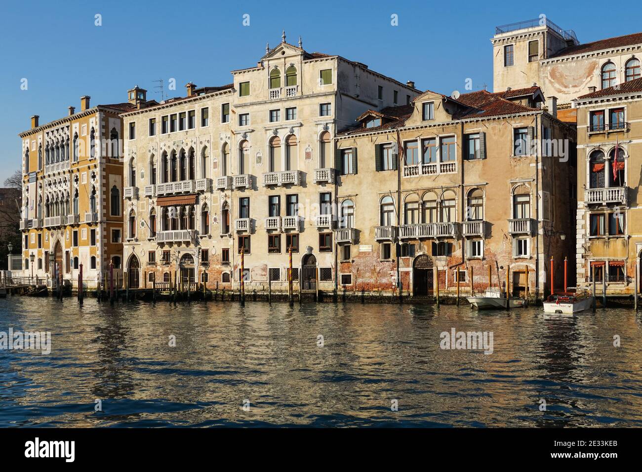 Old traditional Venetian buildings on the Grand Canal in Venice, Italy ...