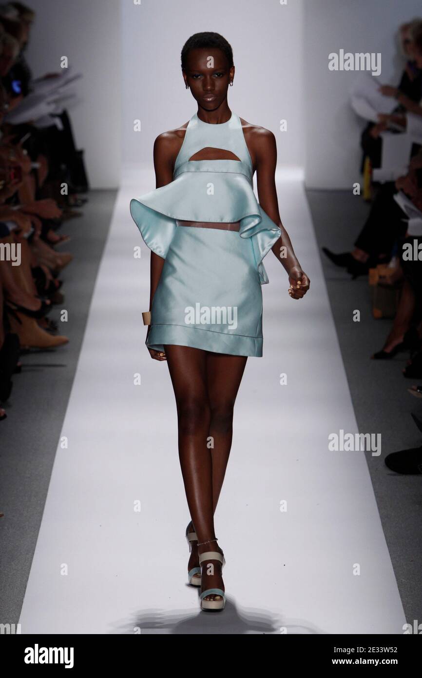 A model displays a creation by Dennis Basso during his runway show ...