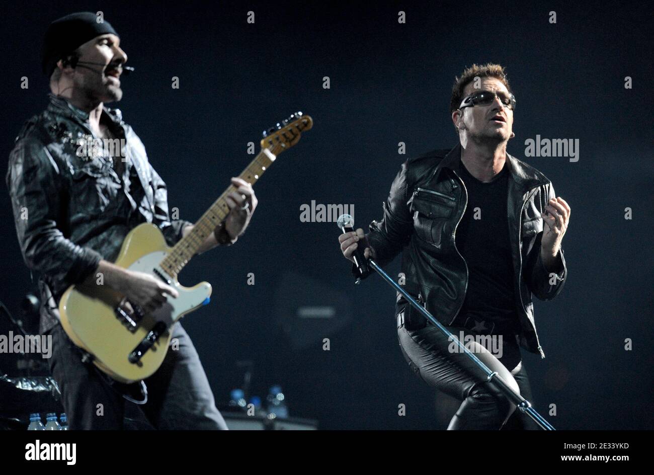 Bono (Paul Hewson) singer of the Irish rock band U2, performs on stage ...
