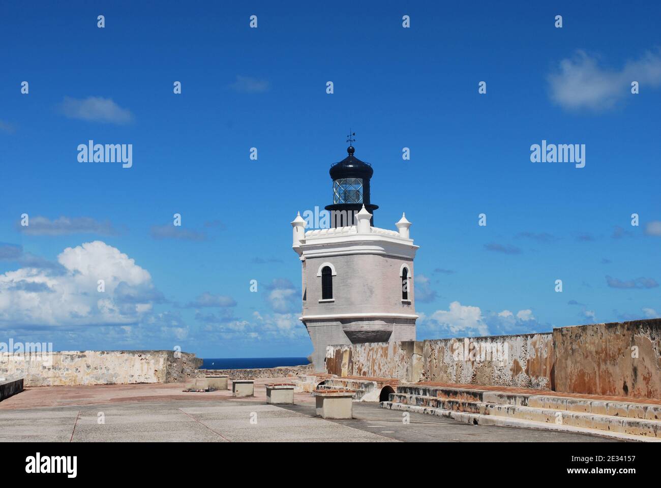 Coastal lighthouse tower at a garrison in Puerto Rico Stock Photo - Alamy