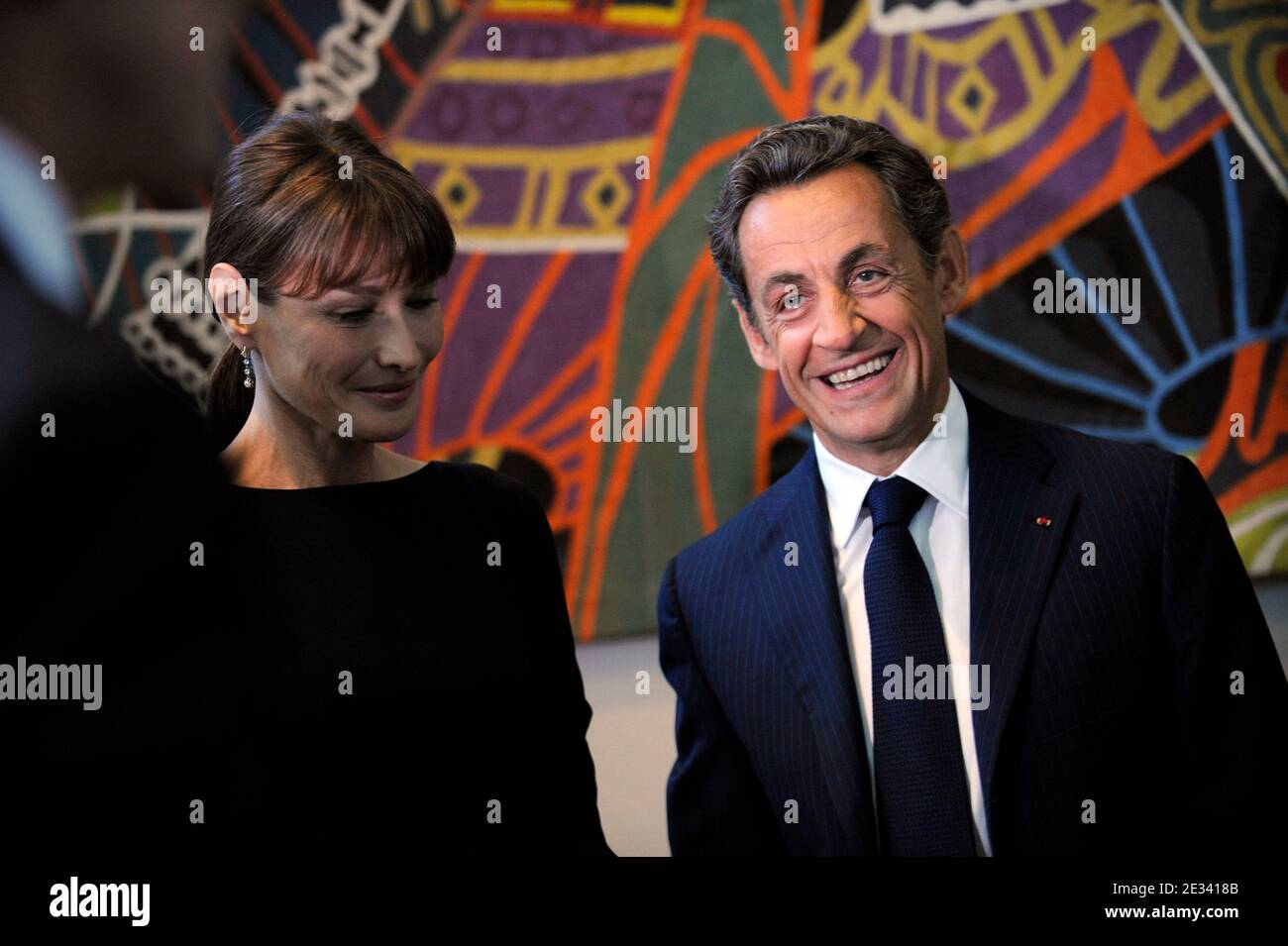 French President Nicolas Sarkozy and his wife Carla Bruni-Sarkozy are ...