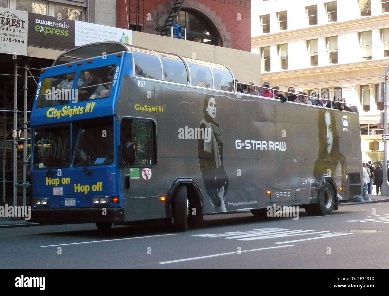 New York Tourist bus with a advertising of G-Star Raw clothing line ...