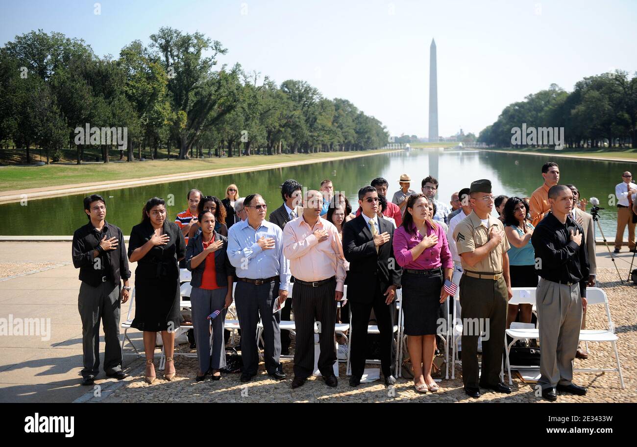 New U.S citizens pledge Allegiance to the flag of the United States of ...