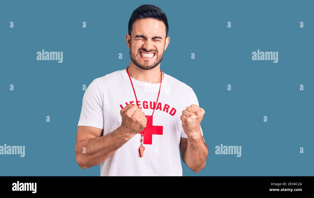 Young hispanic man lifeguard arms hi-res stock photography and images ...