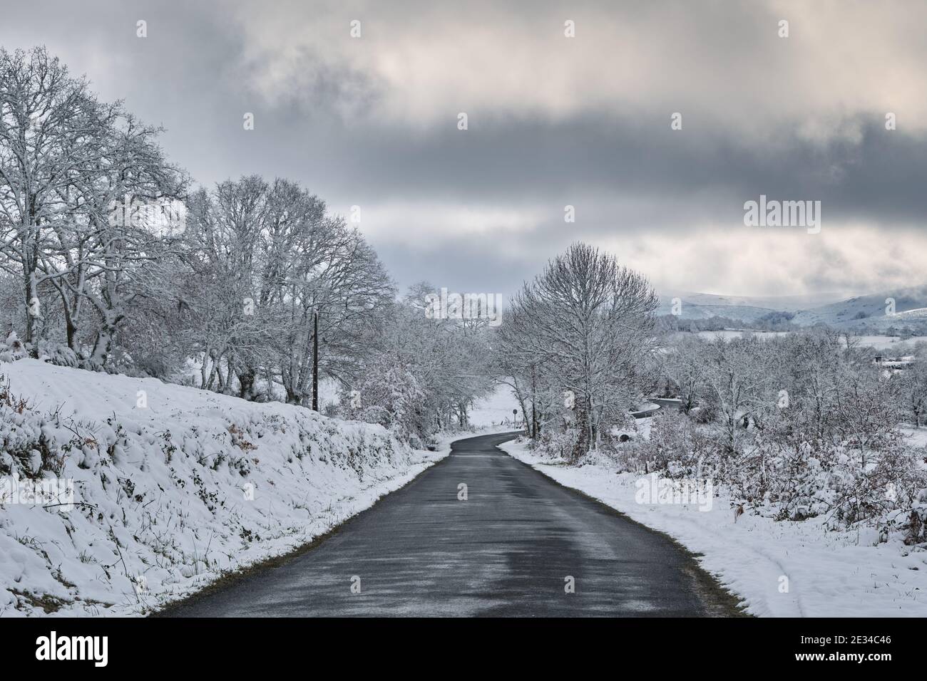 Rural road in snowy mountains hi-res stock photography and images - Alamy