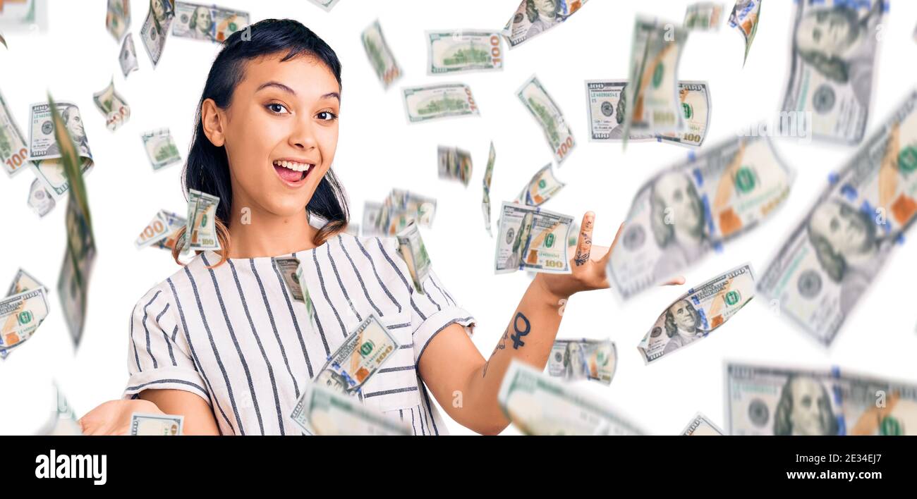 Young woman wearing casual clothes smiling cheerful offering hands ...