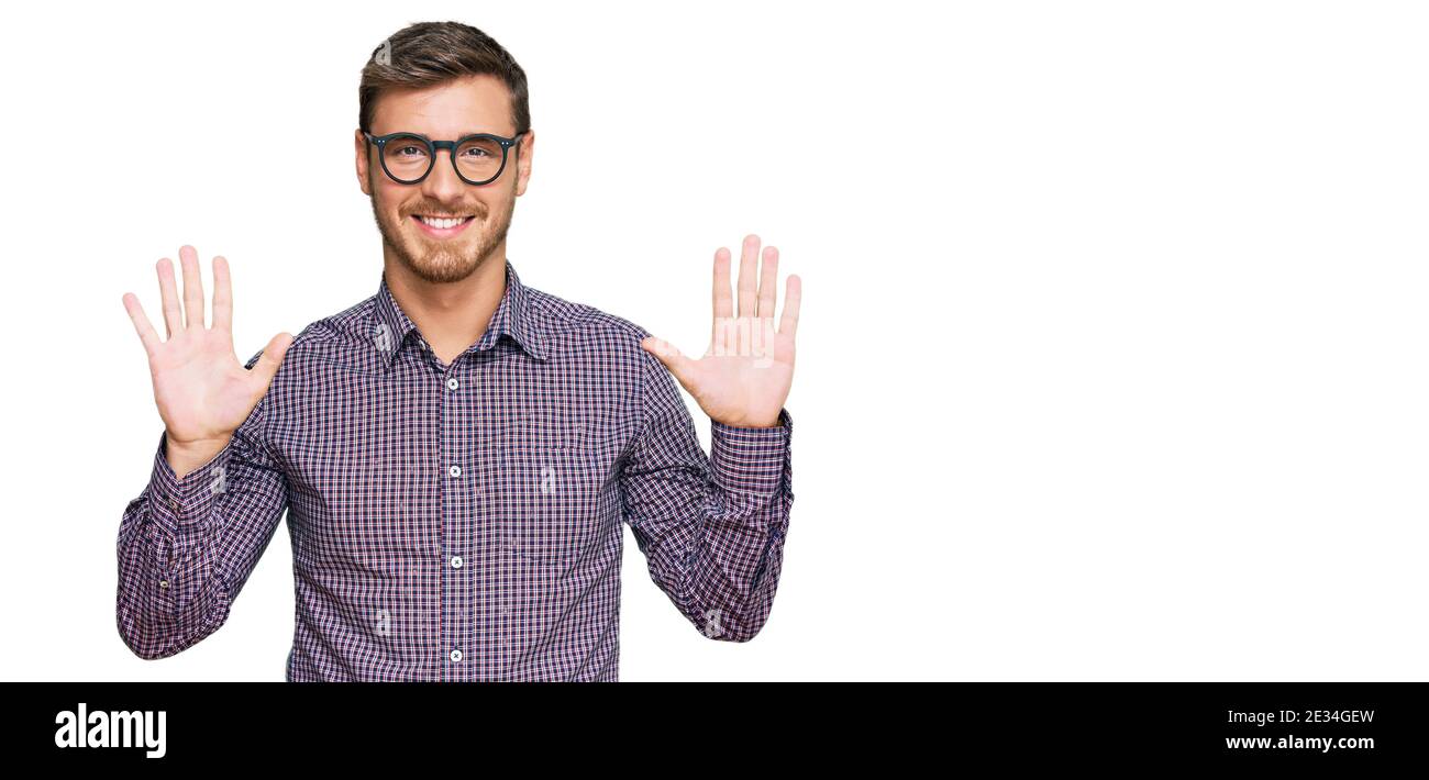 Handsome caucasian man wearing casual clothes and glasses showing and ...