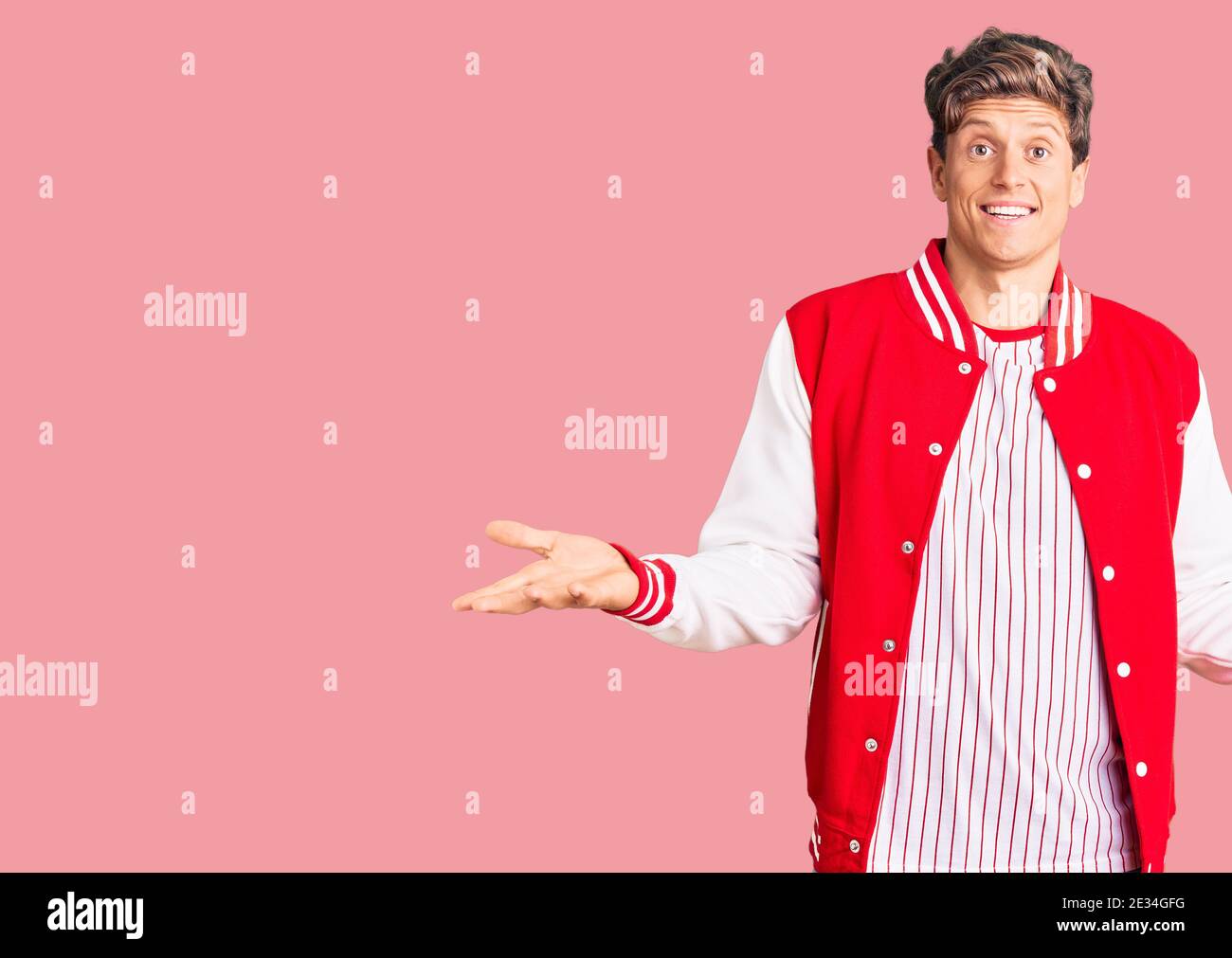 Young handsome man wearing baseball uniform smiling cheerful with open ...