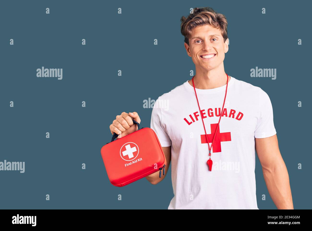 Man wearing lifeguard shirt standing hi-res stock photography and ...