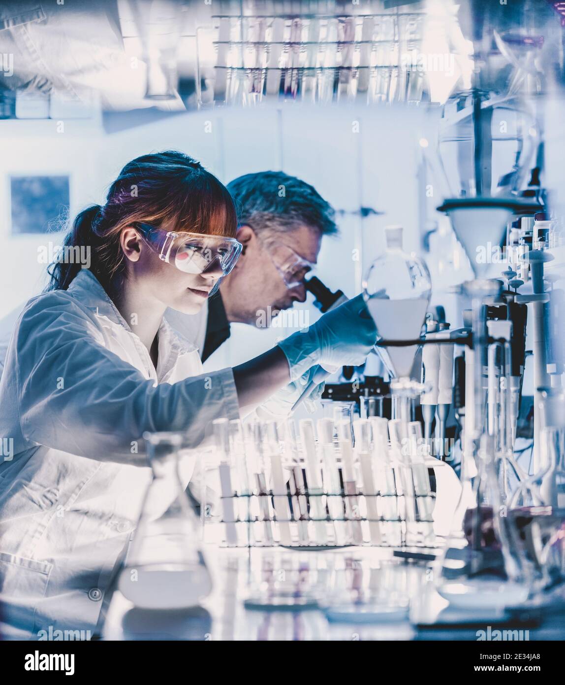 Health care researchers working in scientific laboratory Stock Photo ...