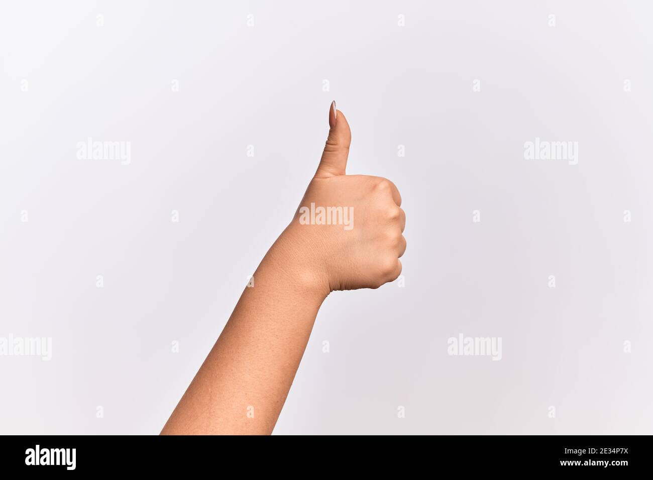 Hand of caucasian young woman doing successful approval gesture with ...