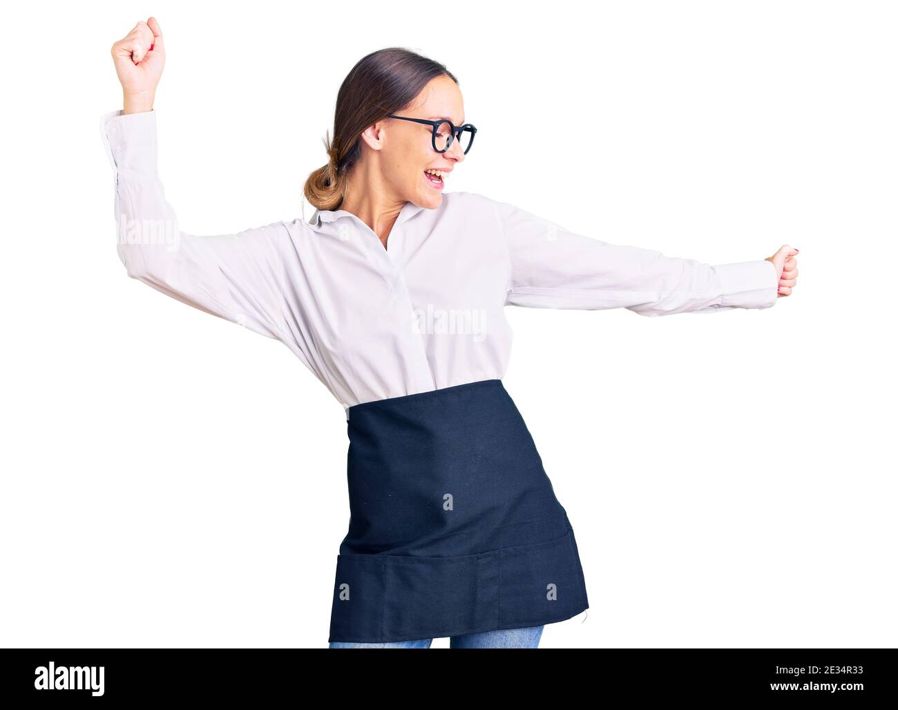 Beautiful brunette young woman wearing professional waitress apron ...