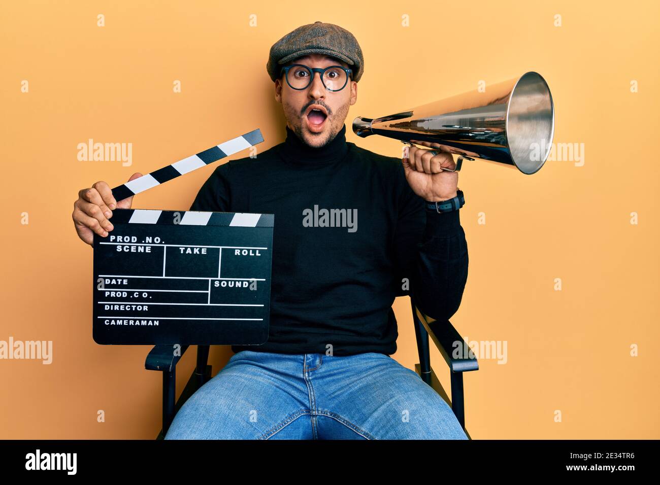 Clapboard Tattoos Hipster Man With Movie Clapper. Man Holding Film