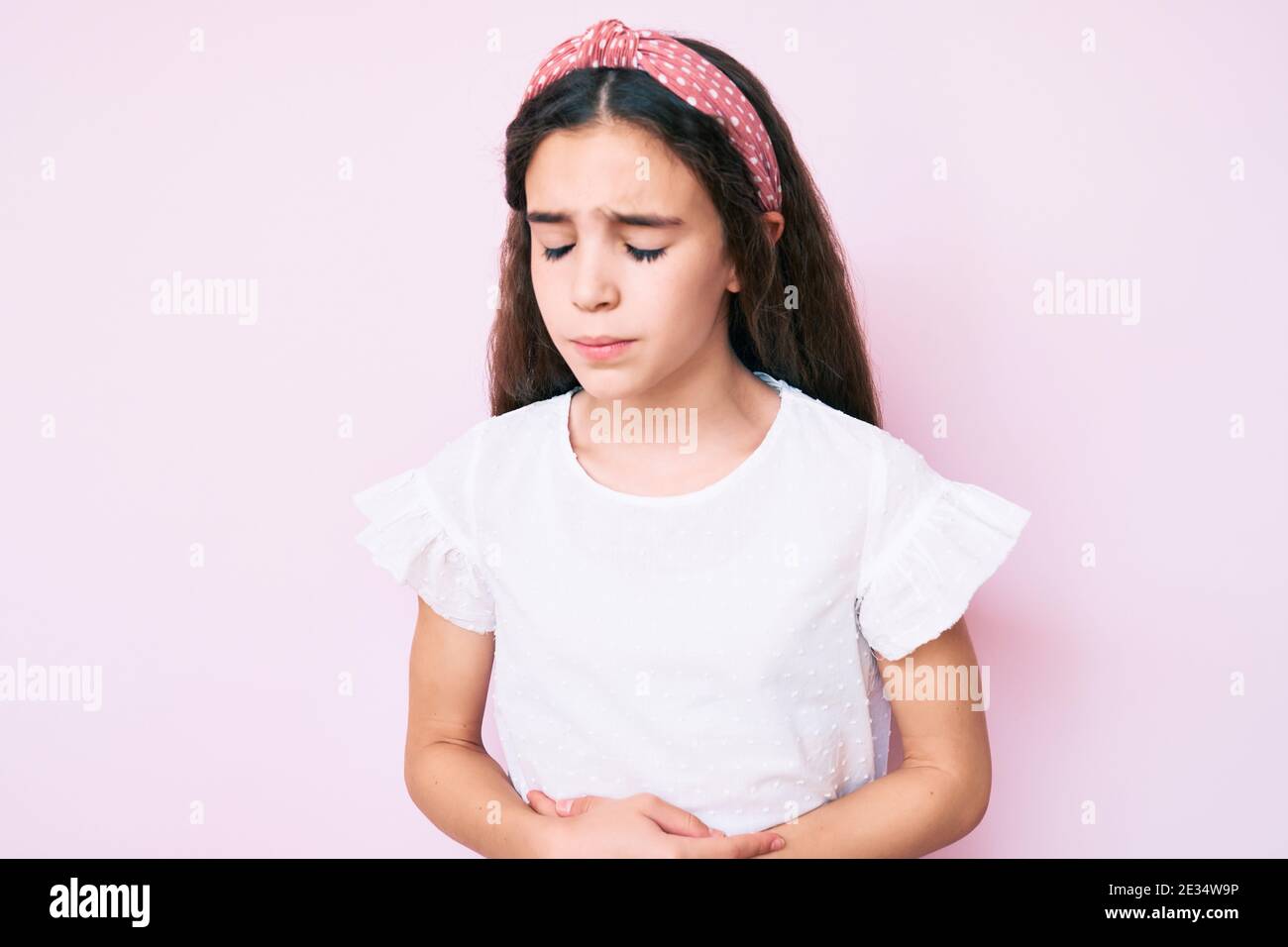 Child and abdominal pain and studio hi-res stock photography and images ...