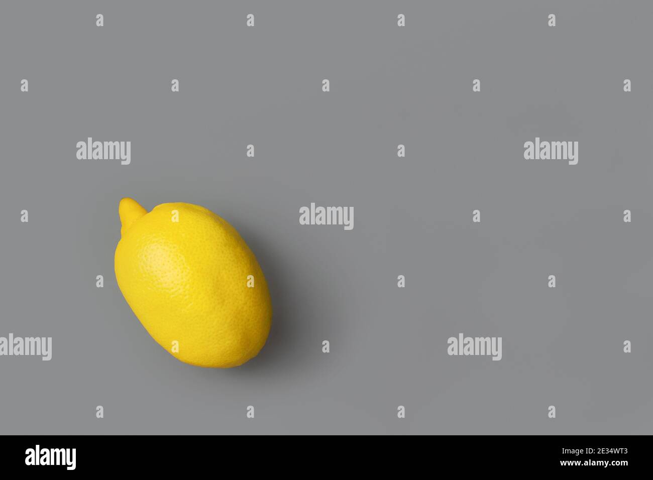 Yellow lemon on gray background. Colors of the Year 2021 Pantone ...