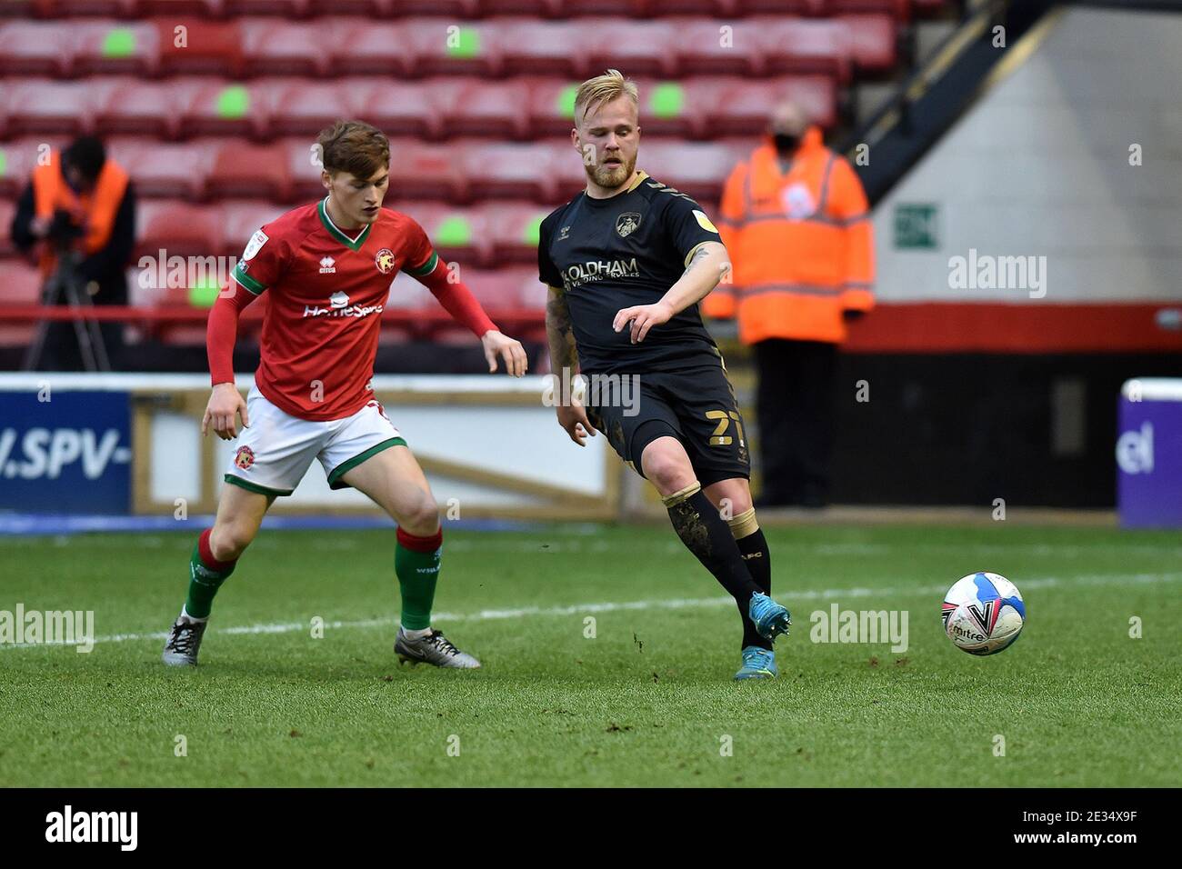 WALSALL, ENGLAND. JAN 16TH: Oldham Athletic's Marcel Hilssner andb ...