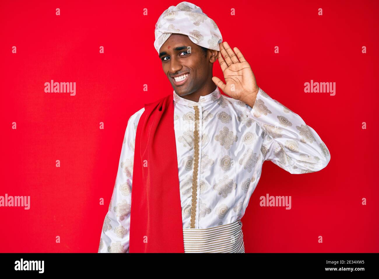 Handsome indian man wearing tradition sherwani saree clothes smiling ...
