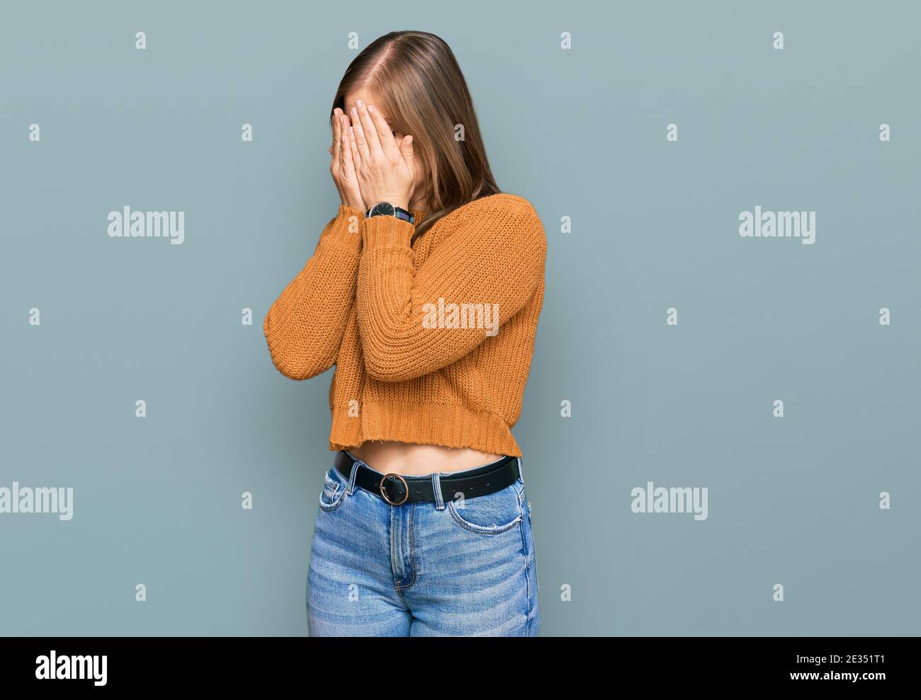 Beautiful caucasian woman wearing casual clothes with sad expression ...