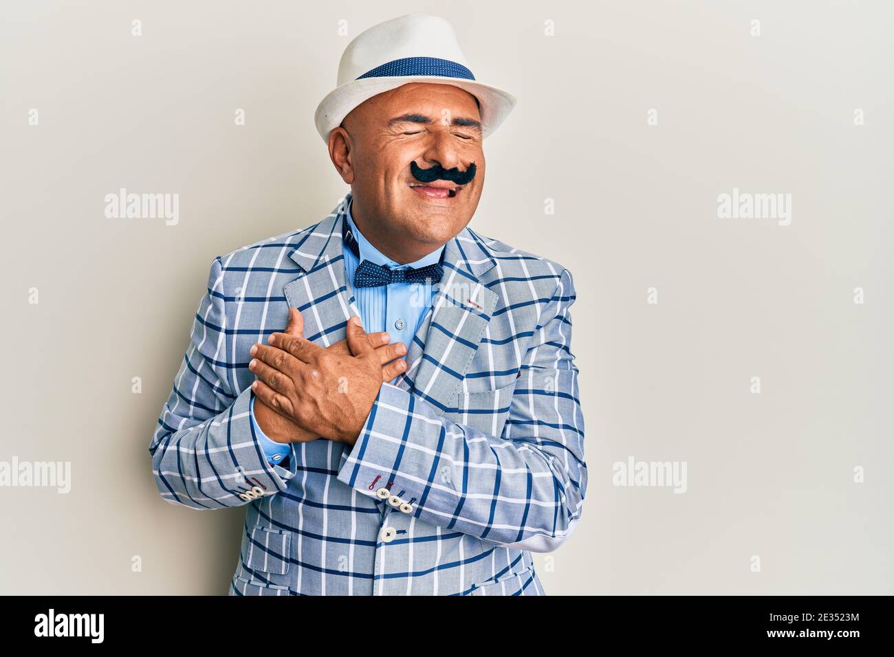 Mature middle east man with mustache wearing vintage and elegant ...
