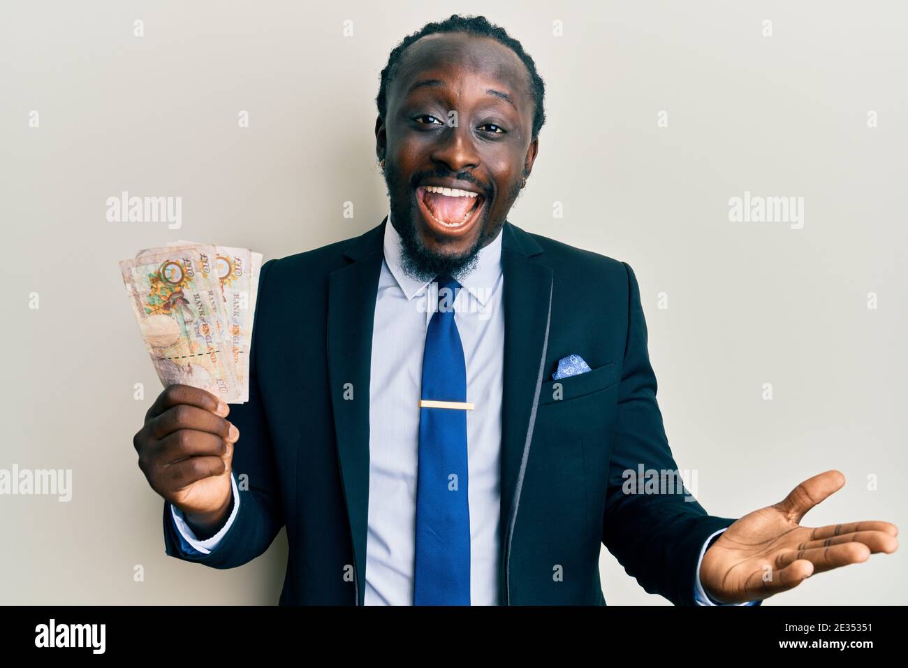 Person winning pounds hi-res stock photography and images - Alamy