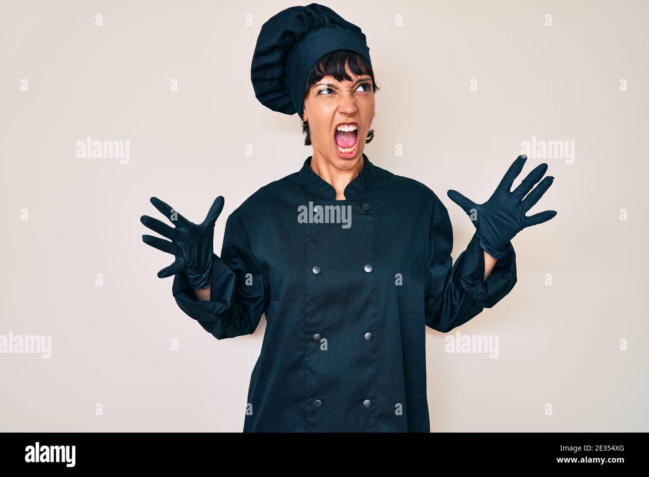 Shouting female cook uniform hi-res stock photography and images - Alamy